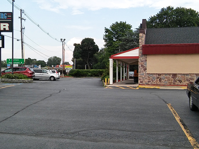 Ample parking welcomes hungry visitors to this roadside haven, where small-town charm meets big-time flavor just off Lincoln Highway.