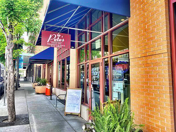 Pete's welcoming storefront with its signature blue awning beckons hungry Knoxville locals and visitors alike. The red-framed windows hint at the warmth waiting inside.