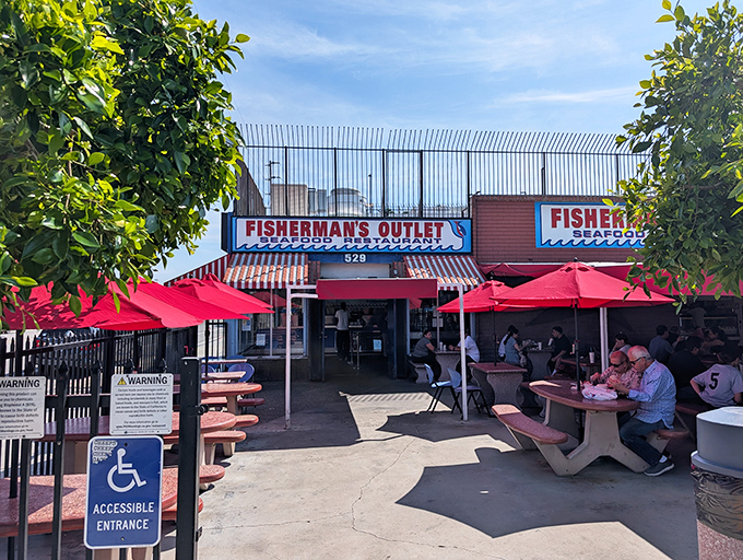 That classic red-and-white striped awning isn't just charming&mdash;it's a beacon calling seafood lovers from miles around.