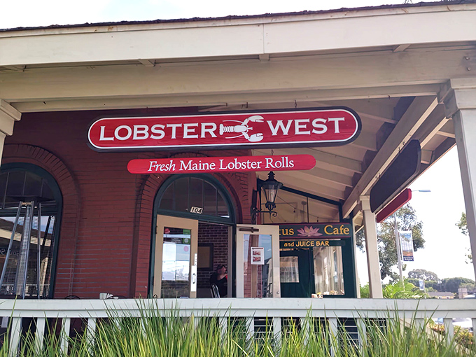 The iconic red Lobster West sign beckons seafood lovers like a lighthouse guiding hungry sailors to shore. Maine meets California in this charming brick storefront.