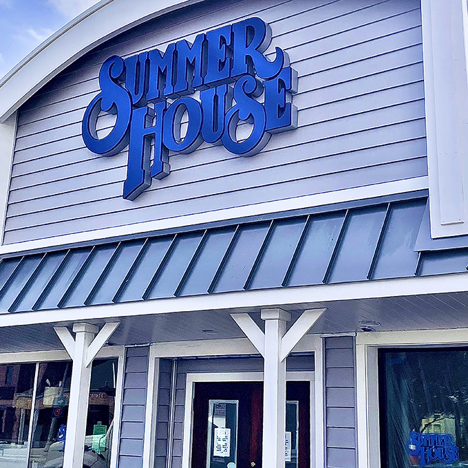 That bold blue lettering against weathered gray siding perfectly captures the restaurant's essence: unpretentious on the outside, extraordinary on the inside.