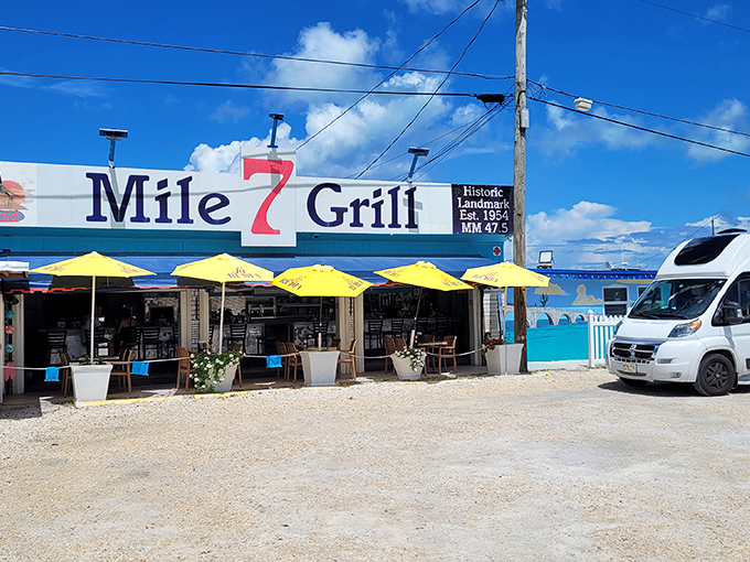 The iconic blue exterior with its bold red "7" beckons hungry travelers like a lighthouse for breakfast enthusiasts.