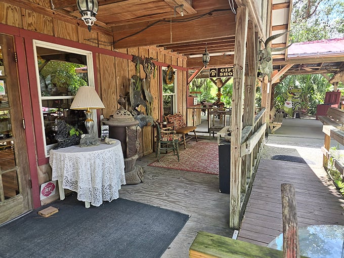 The rustic wooden porch welcomes you like an old friend, complete with vintage decor that whispers tales of Florida's wild past.