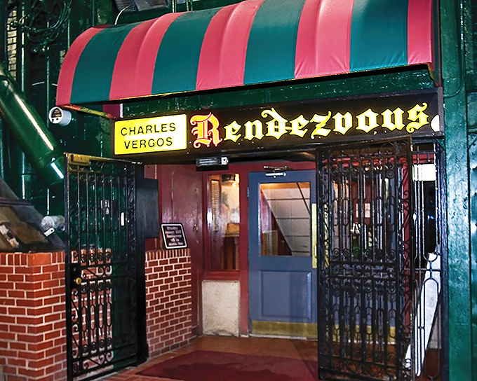 That iconic striped awning and vintage sign – Memphis' equivalent of the Bat Signal for hungry rib enthusiasts everywhere.