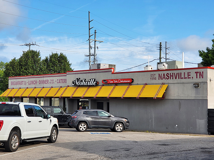 That iconic yellow awning and classic "Noshville" script is like a beacon of hope for hungry souls wandering through Nashville.