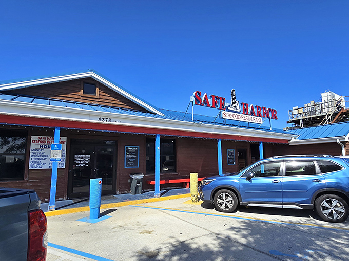 A humble exterior that seafood aficionados recognize as the telltale sign of authenticity. The blue pillars and wooden facade say "focus on the food, not the frills."
