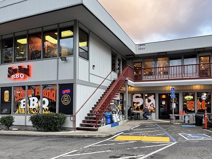 The unassuming exterior of Slow Hand BBQ beckons with its bright red staircase &ndash; like a secret clubhouse where the password is "hungry."