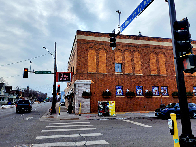 The iconic brick exterior of Jax Cafe stands proudly at University and 20th, like a delicious time capsule waiting to be opened.