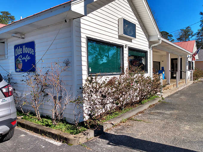 The unassuming white exterior of Olde House Caf&eacute; stands like a culinary speakeasy &ndash; no fancy frills, just the promise of Southern comfort within.
