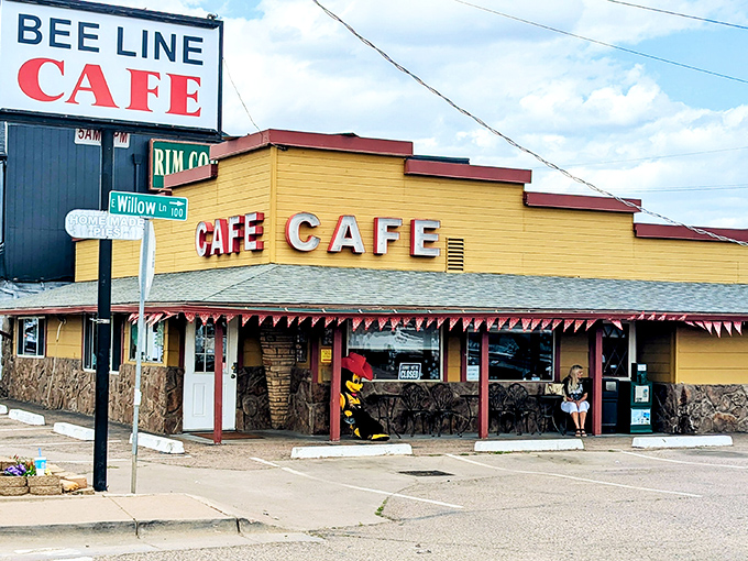 The sunshine-yellow exterior of Beeline Cafe stands out like a beacon of breakfast hope on Payson's main drag, promising comfort food salvation to hungry travelers.