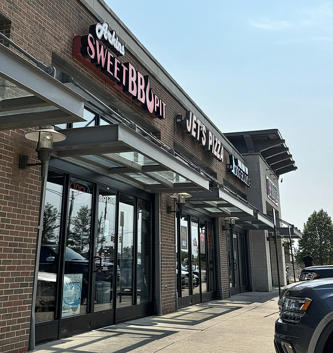 The unassuming storefront of Arkins Sweet BBQ Pit belies the smoky magic happening inside this Southfield barbecue destination.