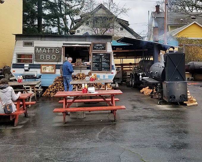 The blue trailer that launched a thousand BBQ pilgrimages. Matt's BBQ stands proudly in Portland, where smoke signals announce serious Texas-style goodness.