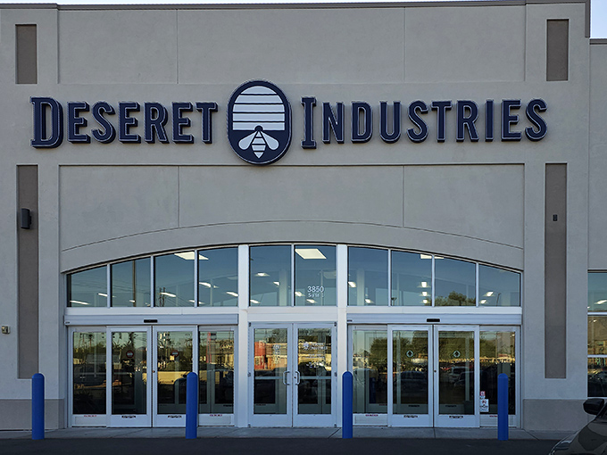 The gleaming facade of Deseret Industries stands like a temple to thrift, promising air-conditioned treasure hunting in the Arizona heat.