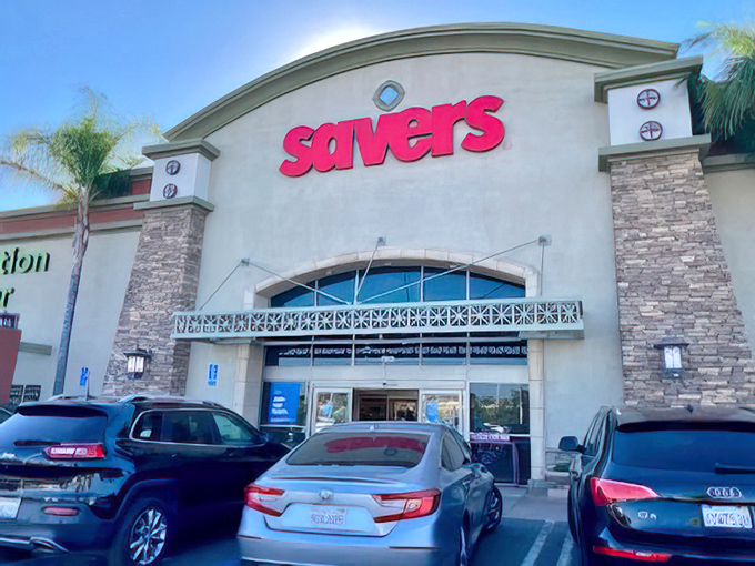 The stone facade and bold red signage of Savers in Murrieta promises treasure hunting that's more upscale adventure than typical thrift dive.