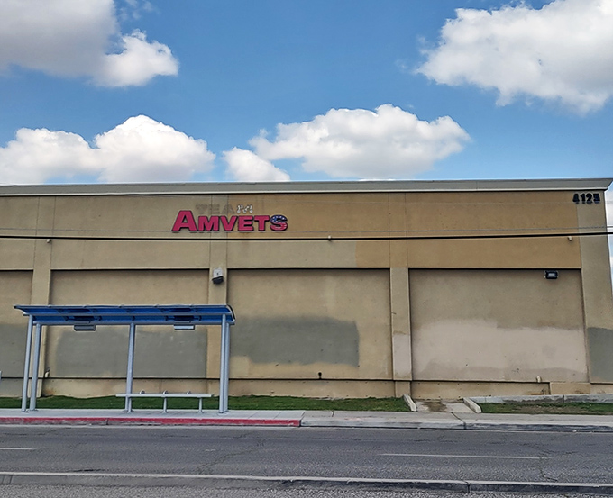 Another AMVETS location stands ready for bargain hunters under California's impossibly blue sky, a thrift oasis waiting to be explored.