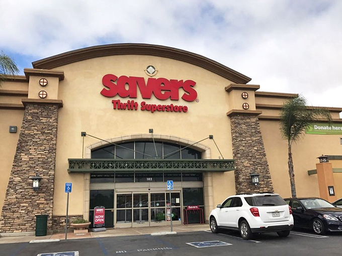 The stone facade and bold red signage of Savers in Murrieta promises treasure hunting that's more upscale adventure than typical thrift dive.