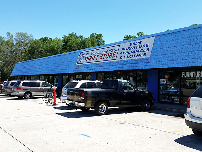 The blue-roofed treasure trove where shopping carts become magic carpets to bargain wonderland.
