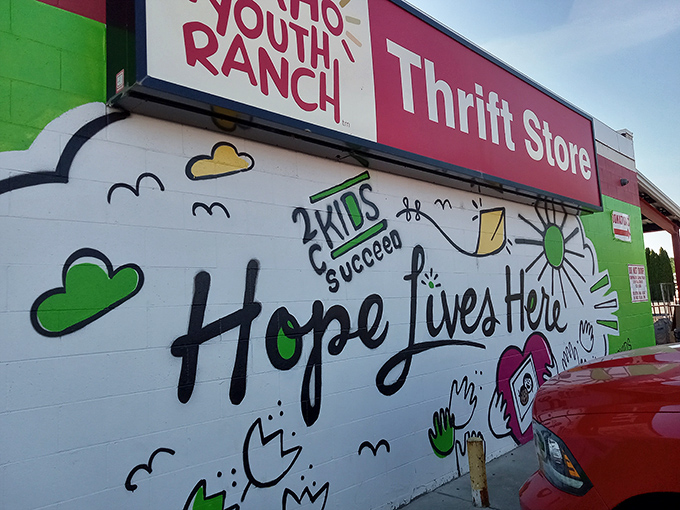 The colorful "Hope Lives Here" mural welcomes treasure hunters to Idaho Youth Ranch. Every brushstroke tells a story of community impact beyond just bargain hunting.