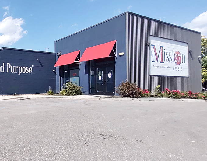 That modern exterior with its bold red awnings signals something special waiting inside for budget-savvy treasure hunters.