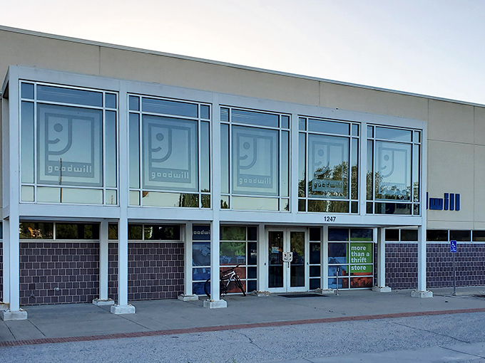 The modern exterior of Goodwill in Derby beckons with its clean lines and signature blue logo&mdash;a treasure chest disguised as a retail store.