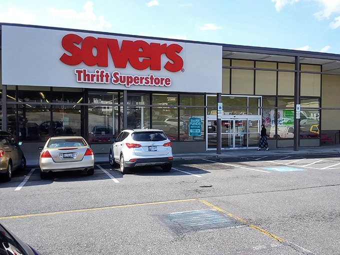 The iconic red Savers sign beckons like a lighthouse for bargain hunters. Your wallet's happy place awaits inside these doors.