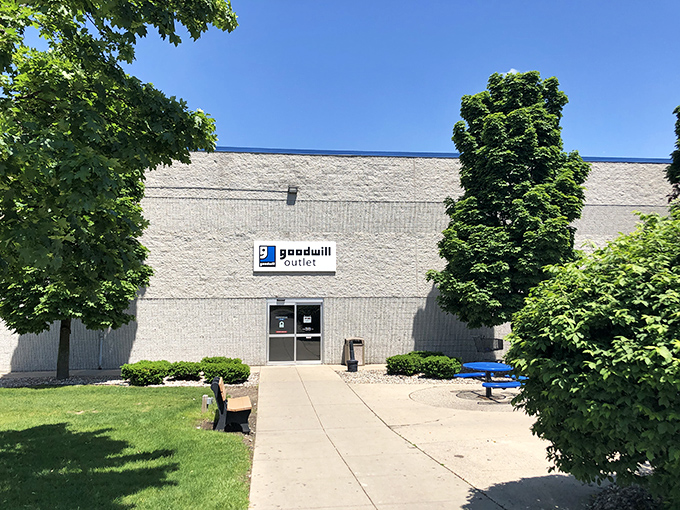 The unassuming exterior of treasure-hunting paradise. Behind this blue-topped facade, bargain hunters prepare for retail adventures that would make Indiana Jones jealous.