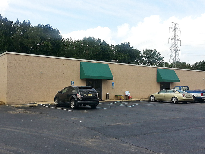 The unassuming exterior of Thrift Village belies the wonderland of treasures inside, like a plain book cover hiding an epic adventure.