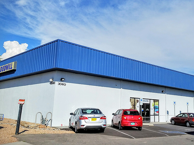 The bright blue trim of this Cerrillos Road Goodwill beckons like a desert oasis for bargain hunters. Treasure awaits inside! 