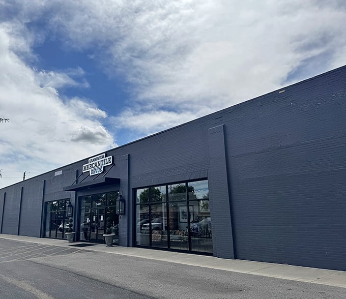 The unassuming gray exterior belies the wonderland within&mdash;like finding a portal to a design universe behind this modest storefront facade.
