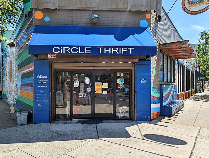 The vibrant blue awning of Circle Thrift beckons like a portal to treasure-hunting paradise. Step inside and let the adventure begin!