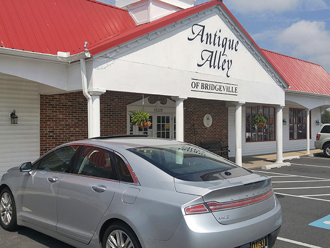 The iconic red-roofed building with its charming cupola stands like a beacon for treasure hunters. You can practically hear it whispering, "Come inside, I've got stories to tell."