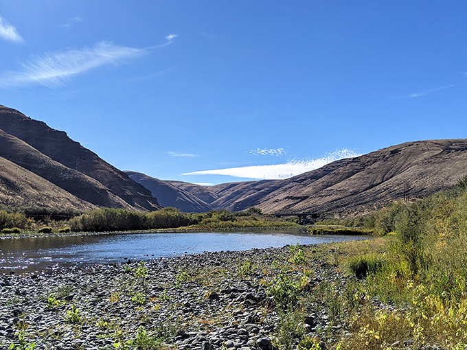 Where golden hills meet azure waters, Cottonwood Canyon offers a symphony of colors that no filter could improve. Nature's own masterpiece.