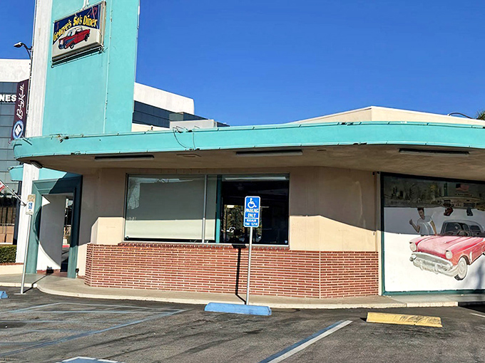 Another angle of the diner's distinctive exterior showcases its mid-century charm &ndash; architectural proof that sometimes the best things haven't changed since your parents' first date.