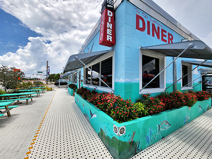 The turquoise-trimmed exterior of Lighthouse Diner stands like a cheerful beacon for hungry travelers. Florida architecture meets classic Americana in the best possible way.