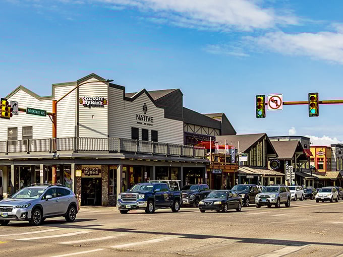 Western storefronts line the streets where cowboy culture meets mountain sophistication in perfect harmony.