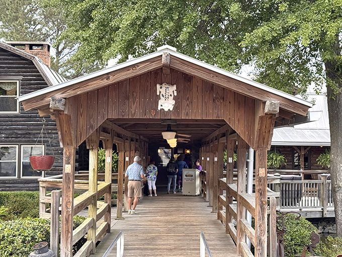 Walking through this covered wooden entrance feels like stepping into a time machine – one that happens to smell deliciously of hickory smoke.