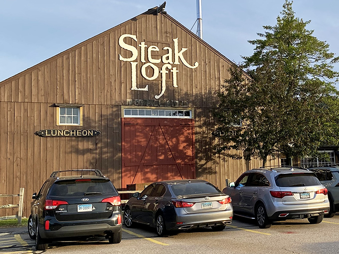 That rustic barn exterior isn't hiding a tractor collection &ndash; it's your gateway to steak paradise.
