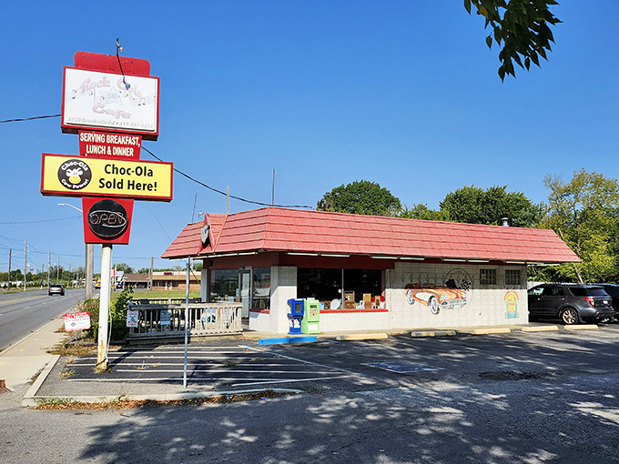 The classic red-roofed exterior of Rock-Cola 50's Caf&eacute; stands like a time portal on Brookville Road, complete with vintage car mural that practically begs you to pop the collar on your leather jacket.