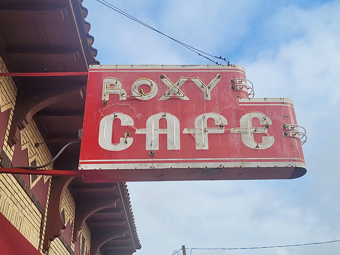 That weathered red sign isn't just advertising - it's practically a Michigan landmark beckoning breakfast lovers everywhere.