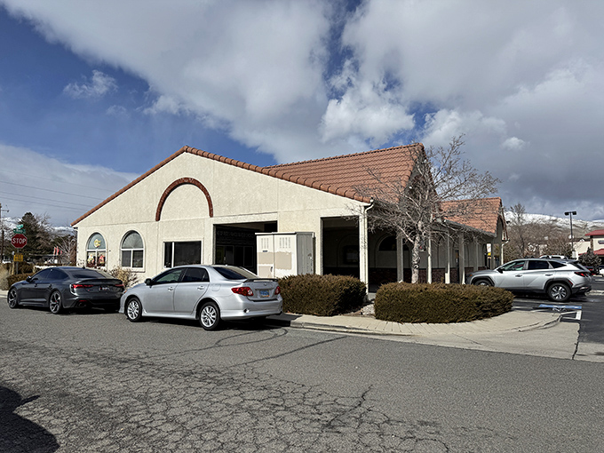 The unassuming exterior of Villa Basque Caf&eacute; stands like a culinary lighthouse in Carson City, beckoning hungry travelers with its simple charm and red-tiled roof.