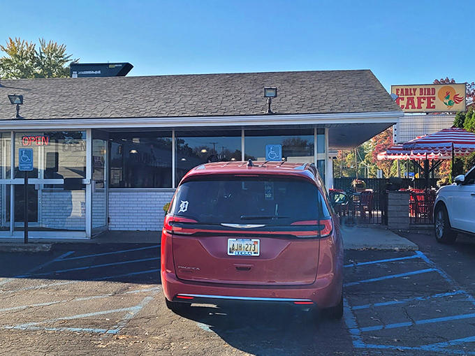The unassuming exterior of Early Bird Cafe stands as proof that culinary treasures often hide in plain sight along Michigan's suburban roadways.