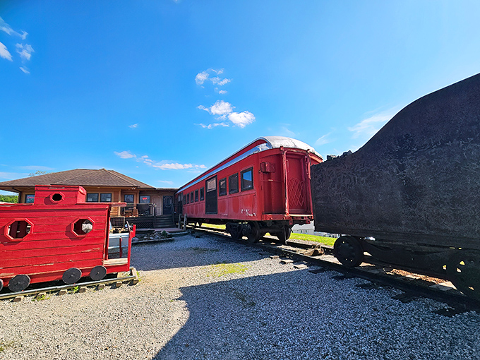Where dining meets nostalgia &ndash; the vibrant red dining car and caboose create an unmistakable landmark that's impossible to miss from the highway.