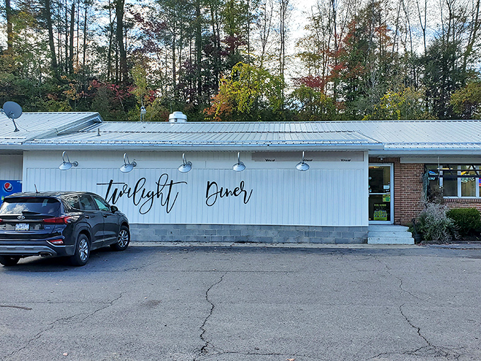 The unassuming white exterior of Twilight Diner stands like a culinary secret waiting to be discovered, nestled among Pennsylvania's colorful foliage.
