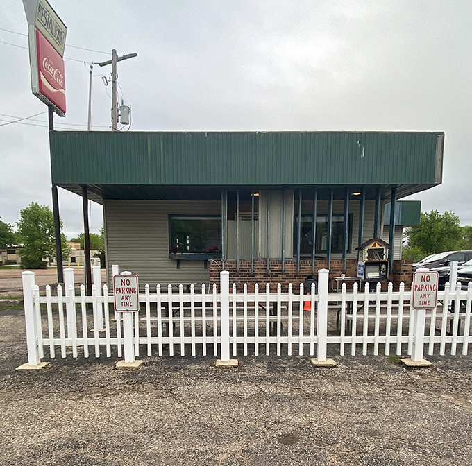 The classic roadside charm of Southpoint Restaurant, complete with American flag and vintage signage. Wisconsin diners don't need fancy facades when the food speaks this loudly.