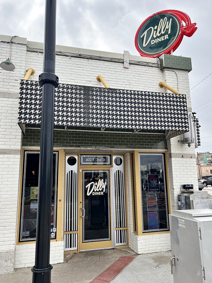 That iconic red and green Dilly Diner sign beckons like a lighthouse for the breakfast-starved souls of Tulsa's Blue Dome District.