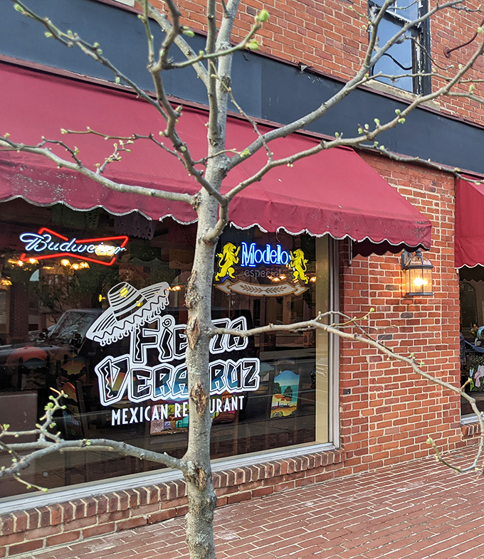 The brick facade and crimson awning of Fiesta Veracruz might not scream "culinary destination," but that neon Modelo sign is practically winking at you&mdash;promising authentic flavors inside.