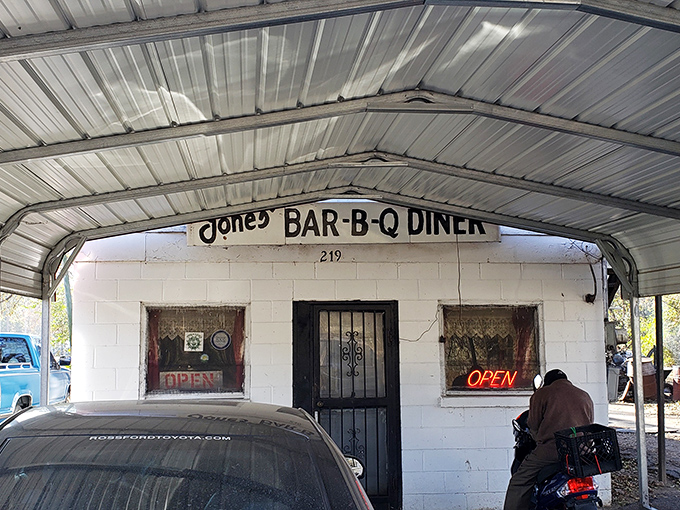 Simplicity speaks volumes at Jones Bar-B-Q Diner, where the unassuming white cinder block exterior and metal awning have welcomed barbecue pilgrims for generations.