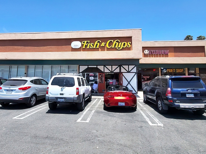The unassuming exterior of Union Jack Fish & Chips hides culinary treasures within, like finding Buckingham Palace tucked between a dry cleaner and hardware store.