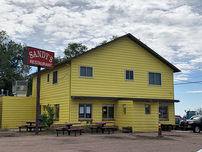 The sunshine-yellow exterior of Sandy's isn't just a building&mdash;it's a breakfast beacon calling to hungry souls across Colorado Springs.