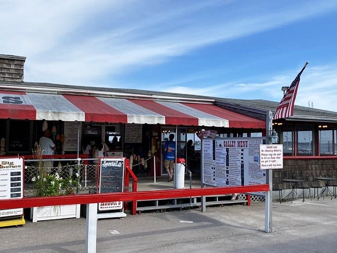 The red and white awnings of Abbott's beckon like maritime flags signaling "delicious seafood ahead." Connecticut coastal dining at its unpretentious best.